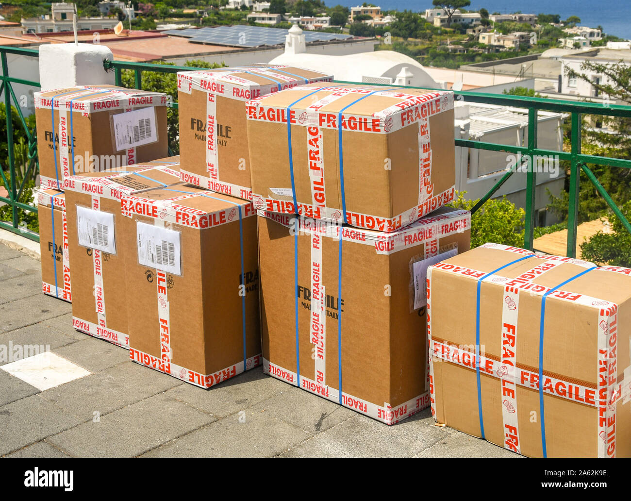 Stacked cardboard boxes on pavement hi-res stock photography and images ...