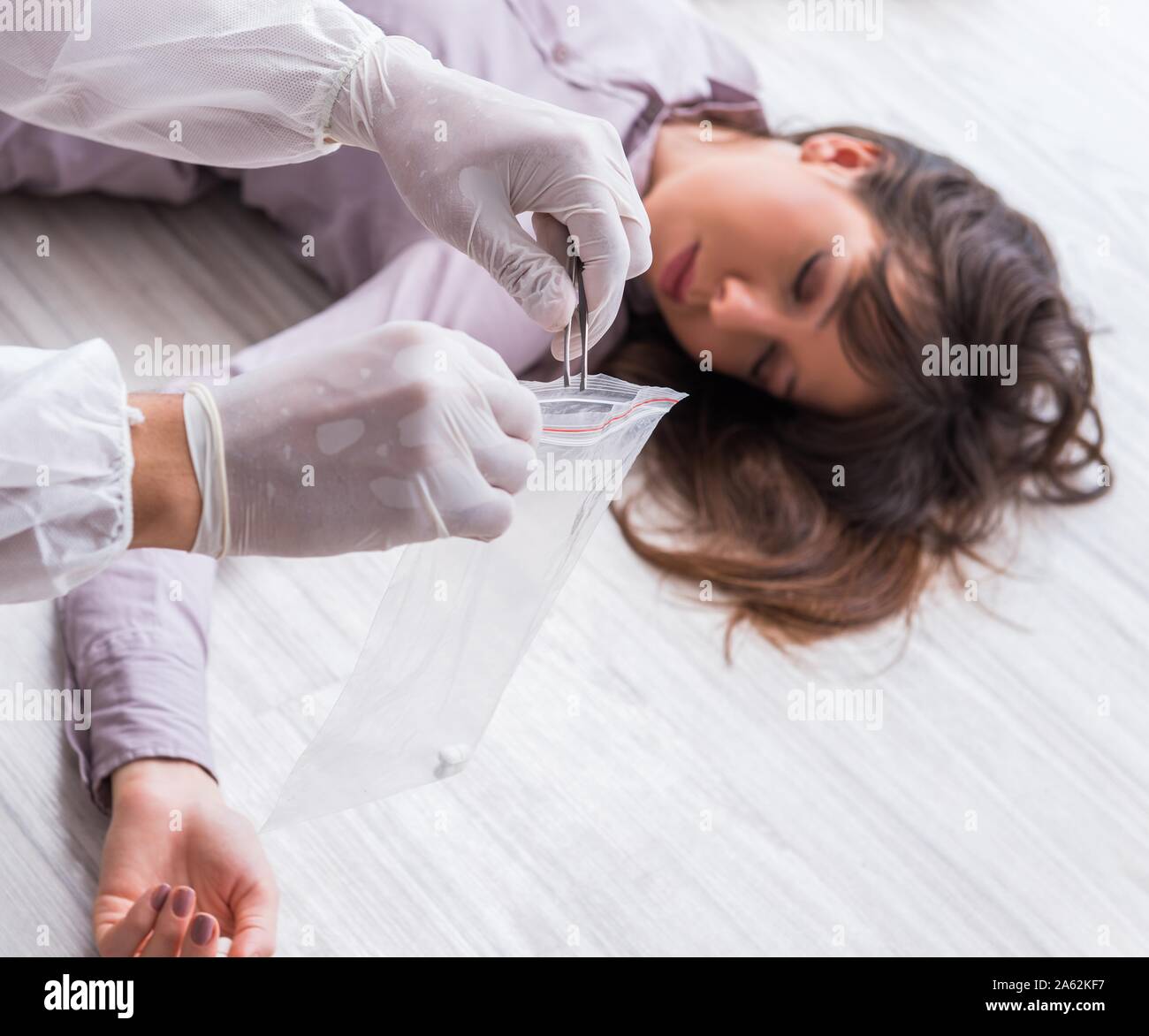 Forensic investigator at the crime scene investigating woman murder ...