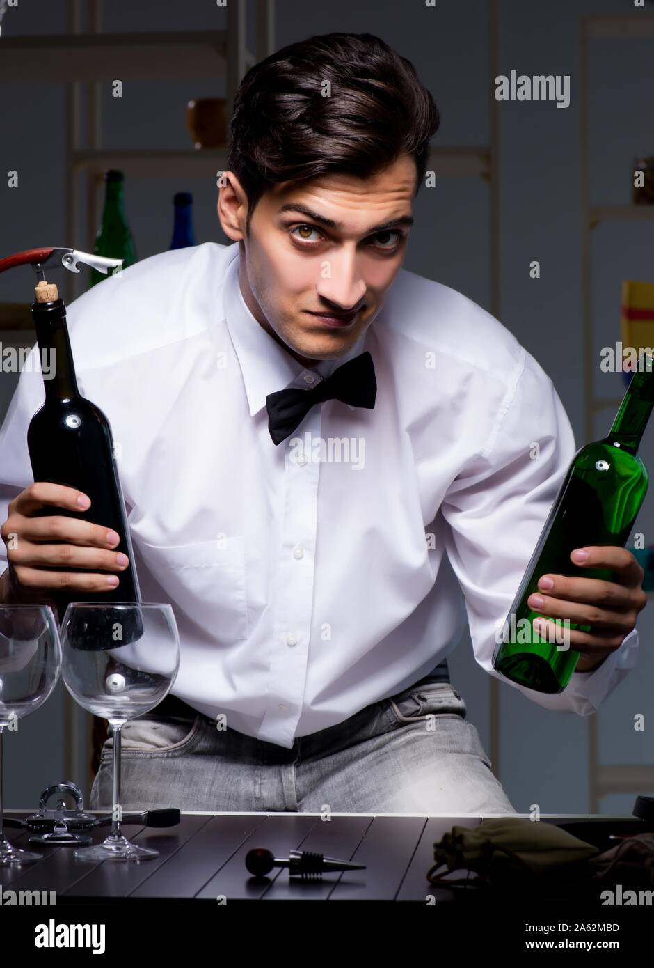 Professional sommelier tasting wine in restaurant Stock Photo - Alamy