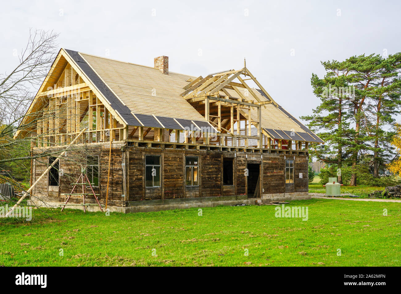 reconstruction and renovation of an old wooden house in a rural area ...