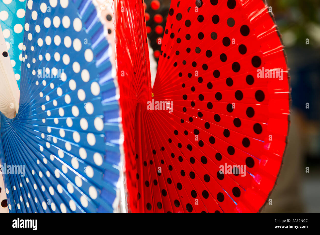 Paper fans open on display at spanish market Stock Photo - Alamy