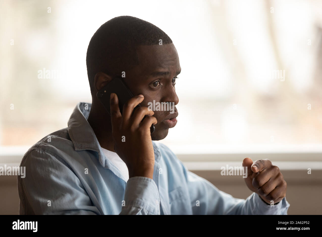 Young black man calling to support call center, problem solving Stock ...