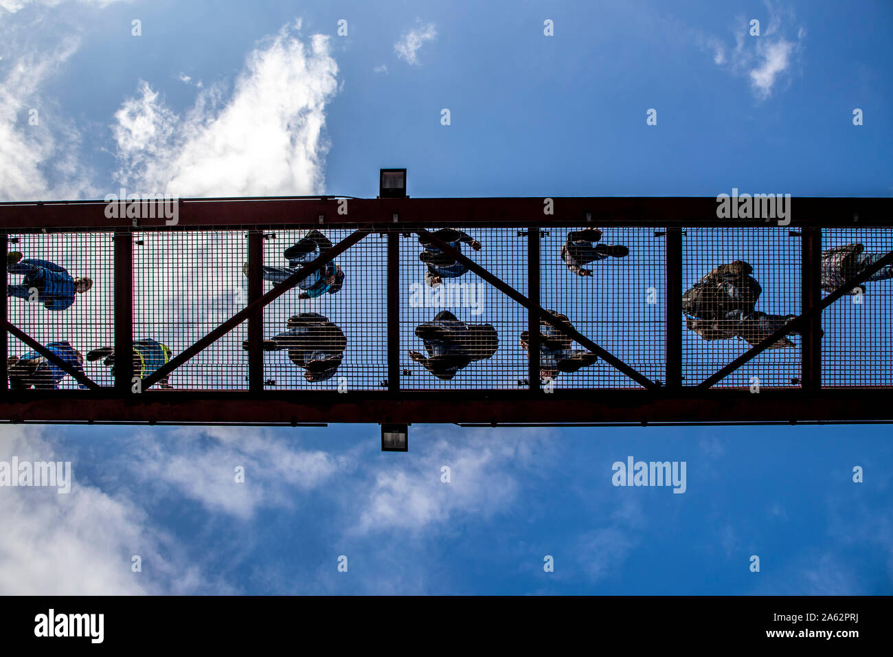 Lattice catwalk, people walking at a height of 15 meters over a catwalk ...