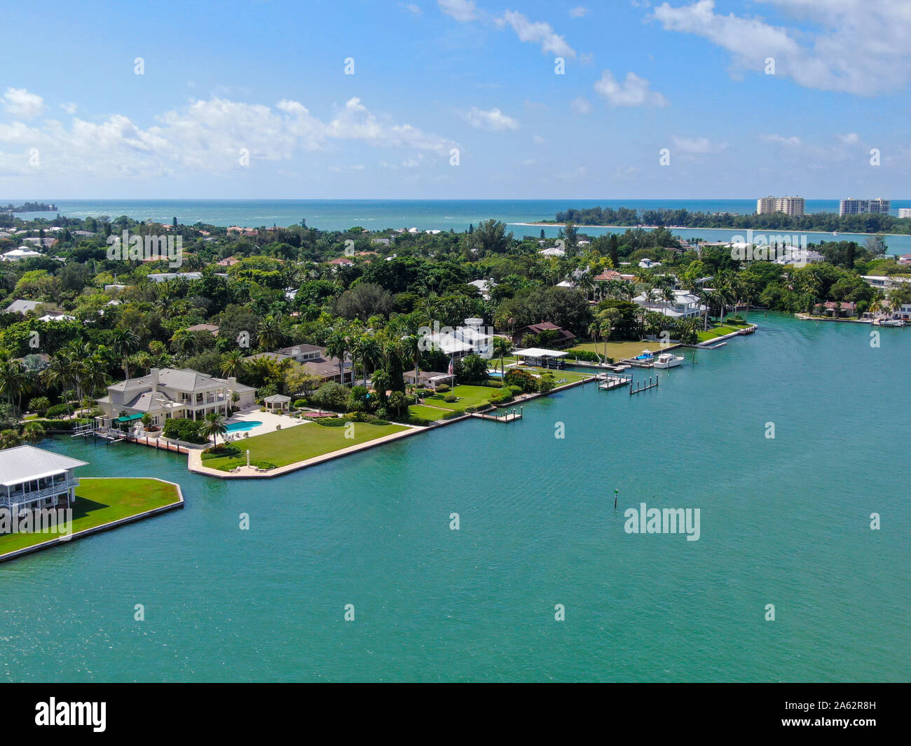 Aerial view of Bay Island neighborhood and luxury villas next the ocean ...