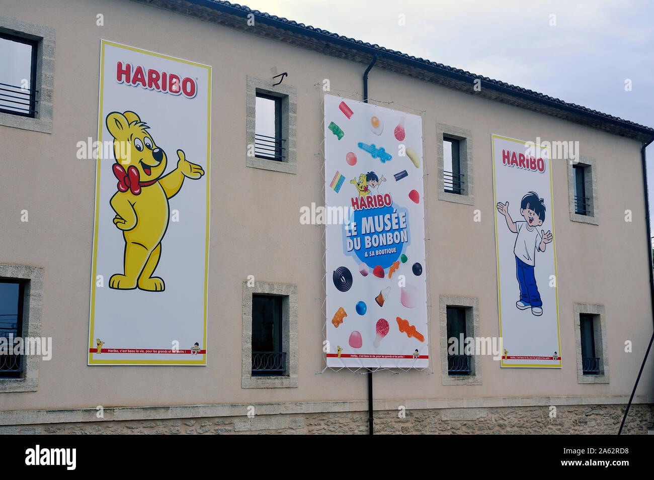Facade of the museum and the Haribo shop in Uzes in the French ...