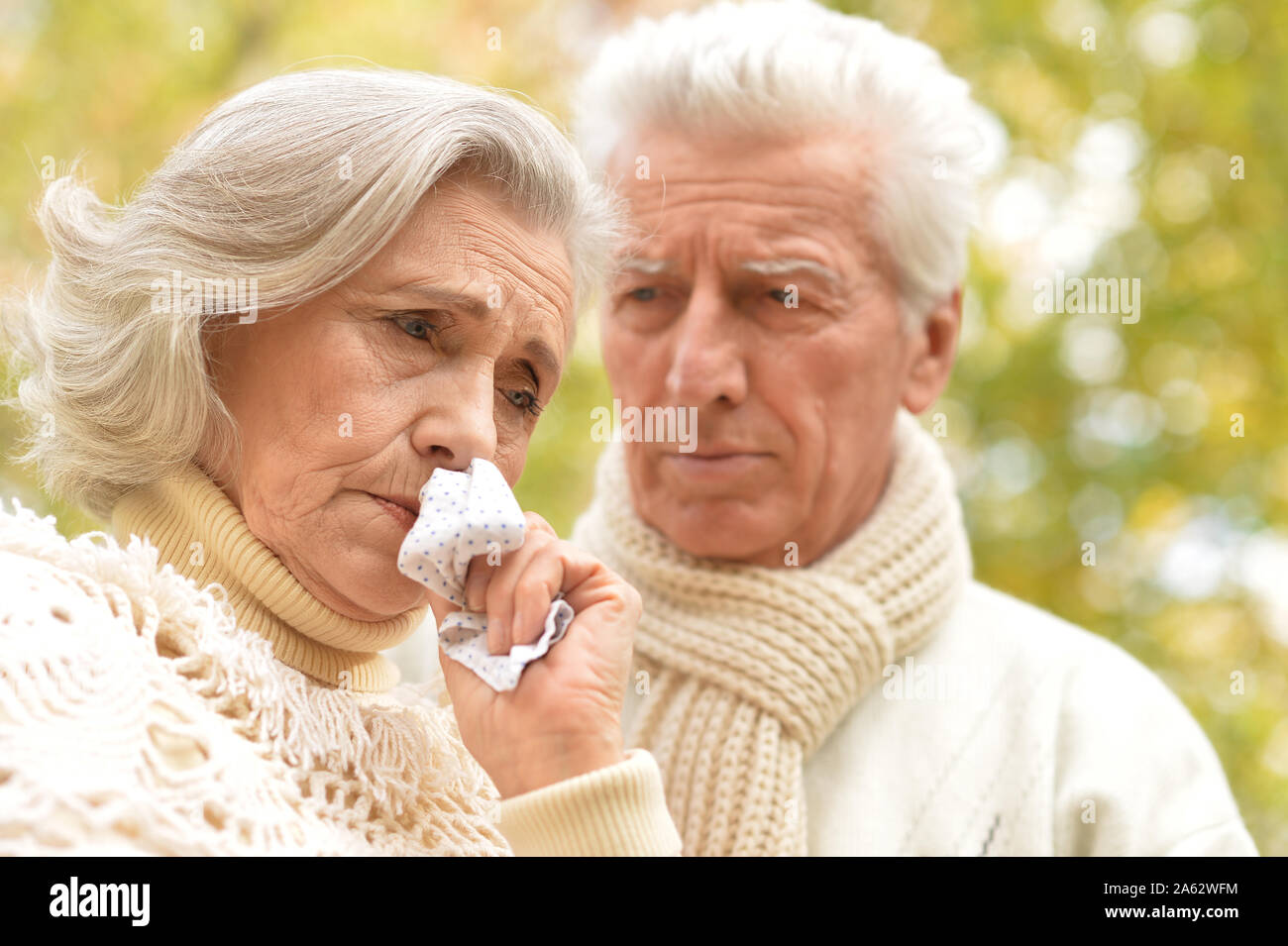 Portrait of unhappy old couple in the park Stock Photo - Alamy