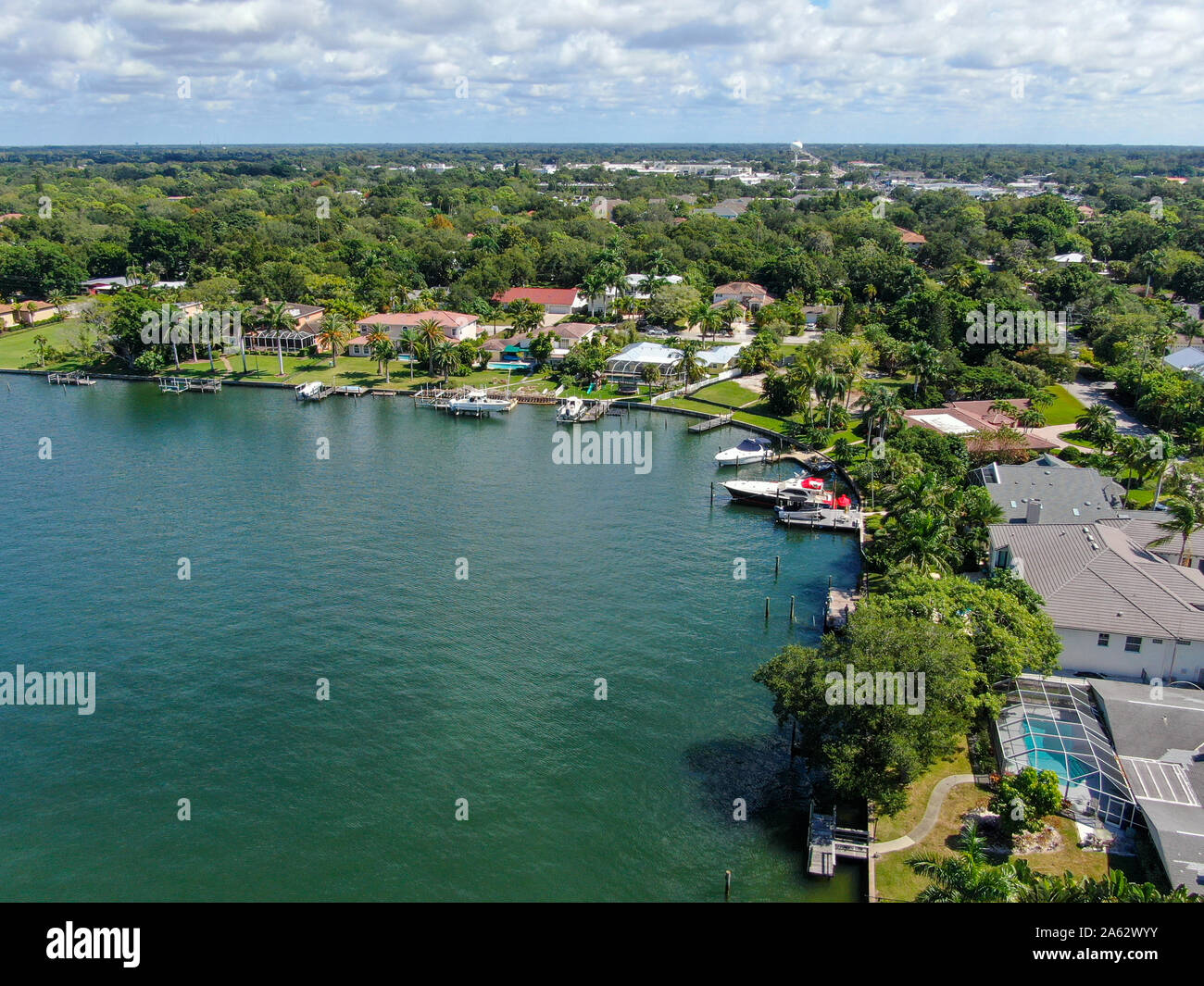 Aerial view of Bay Island neighborhood and luxury villas next the ocean ...