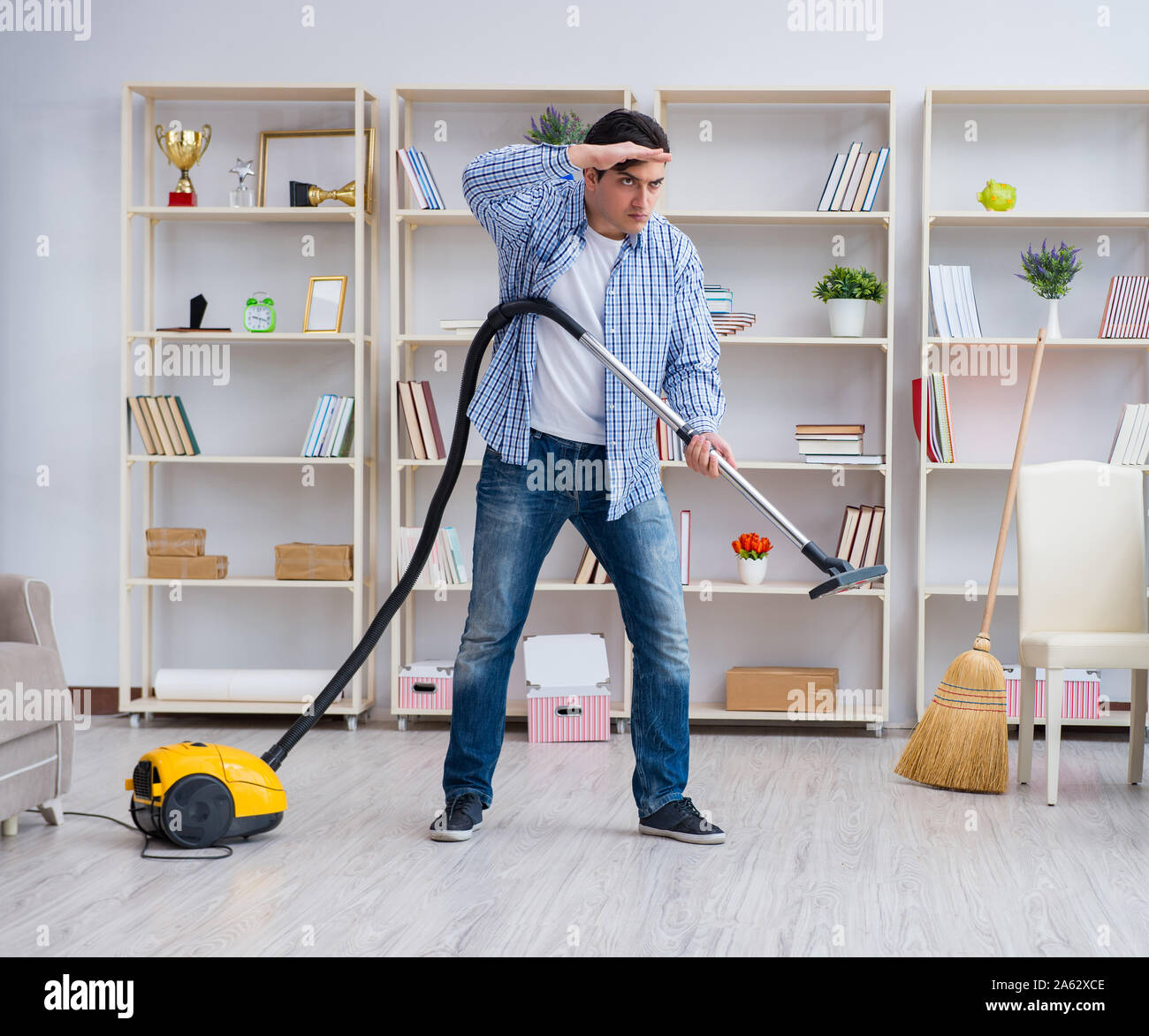The man doing cleaning at home Stock Photo - Alamy