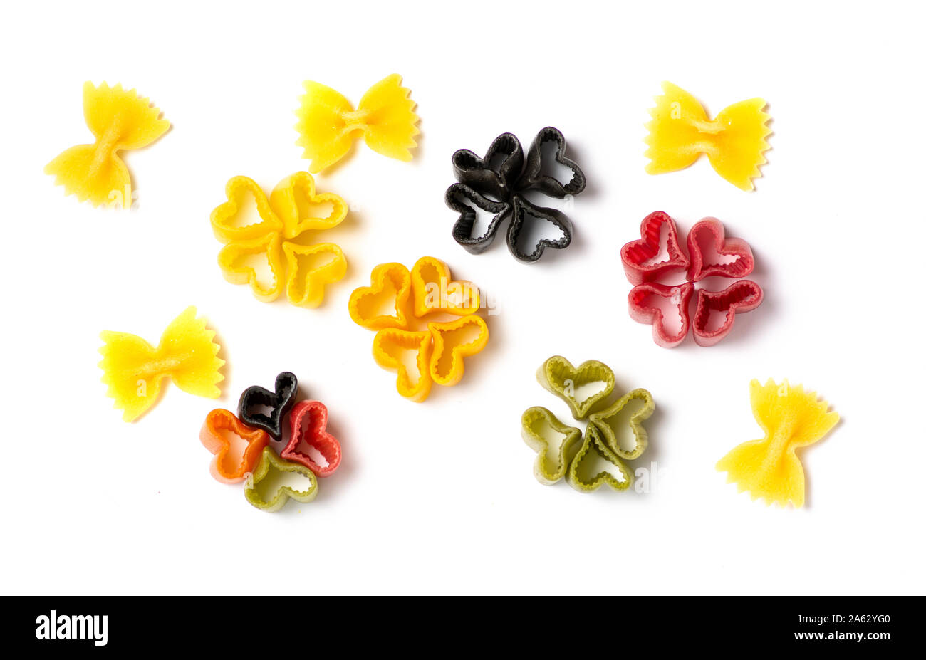 Colorful heart shaped macaroni pasta flat lay isolated Stock Photo - Alamy