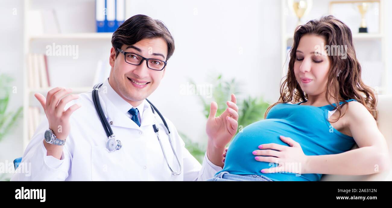Doctor examining pregnant female patient in hospital Stock Photo - Alamy