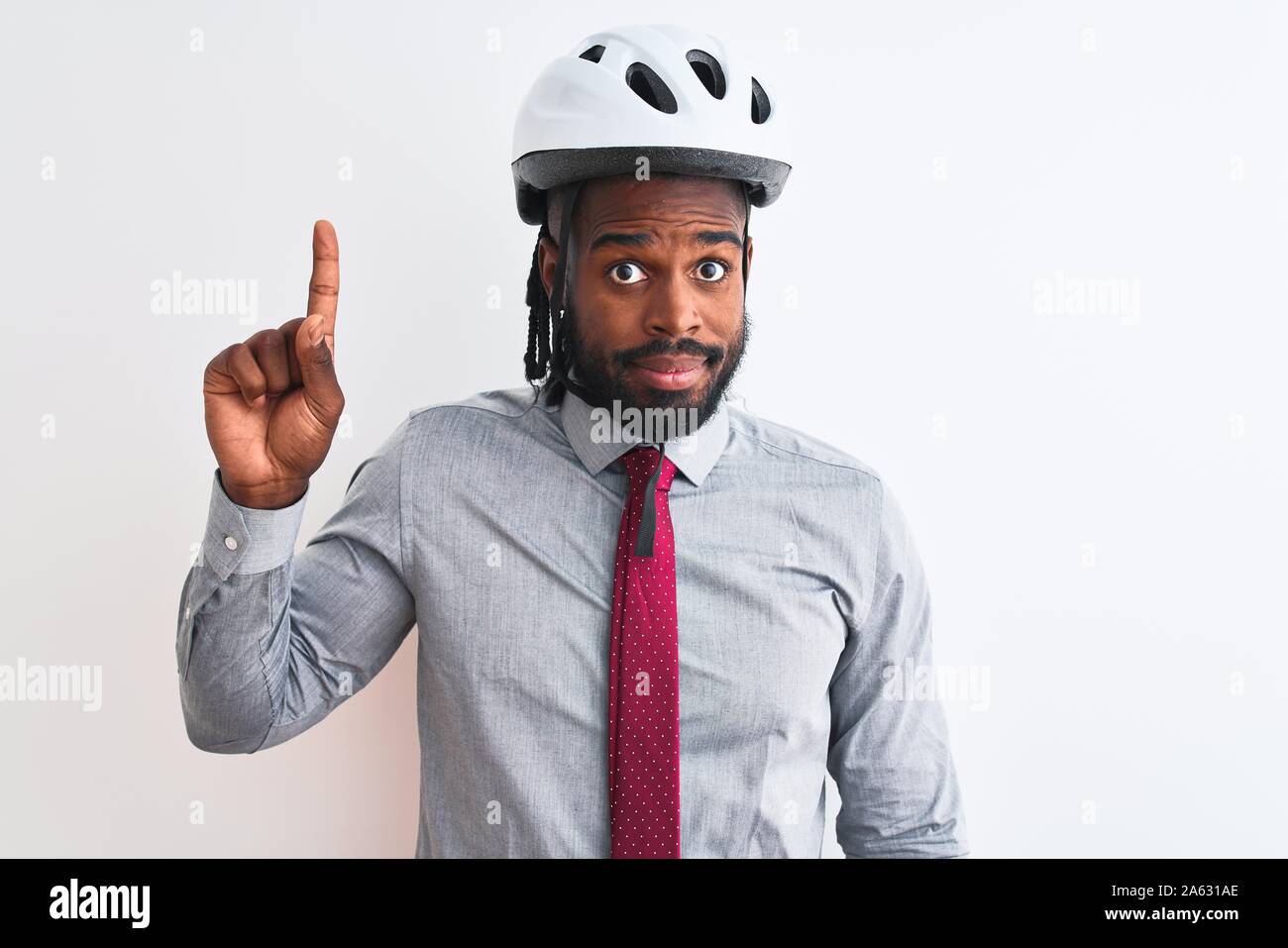 African American Businessman With Braids Wearing Bike Helmet Over