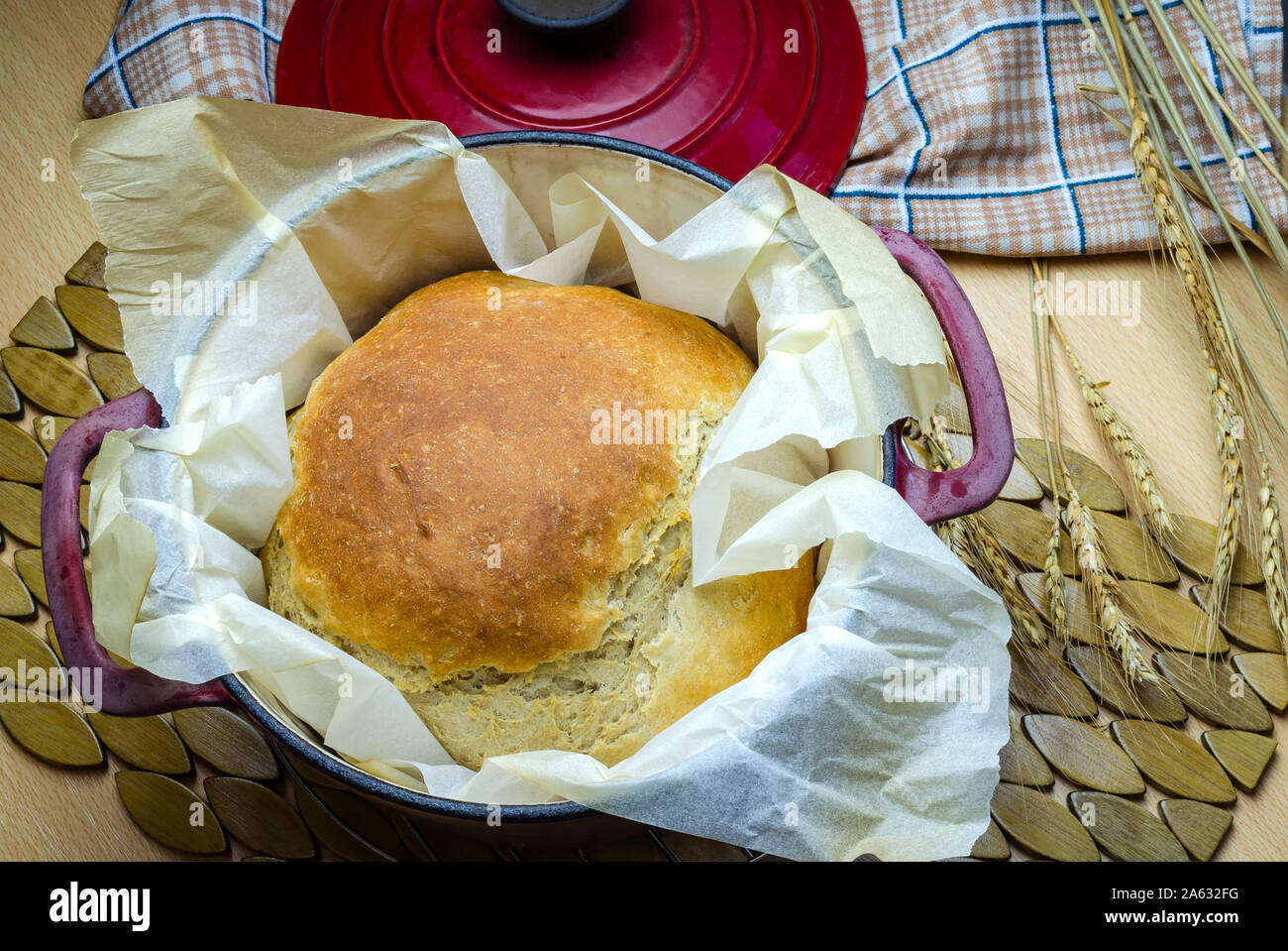 A crock pot containing newly baked home made bread Stock Photo - Alamy