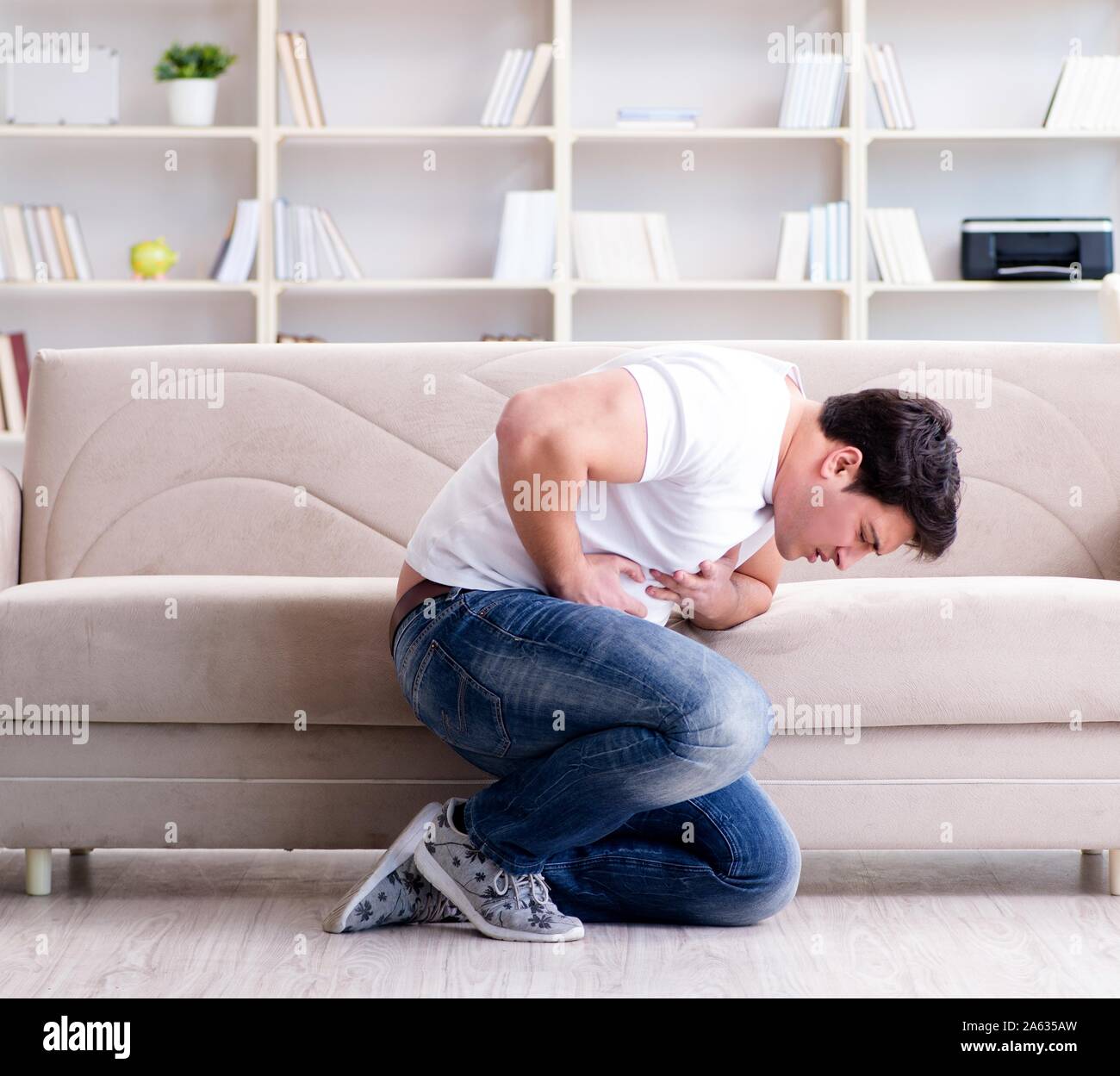 The man suffering from sick stomach and vomiting Stock Photo - Alamy