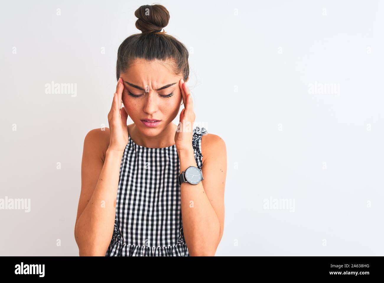 Beautiful Woman With Bun Wearing Casual Dresss Standing Over Isolated