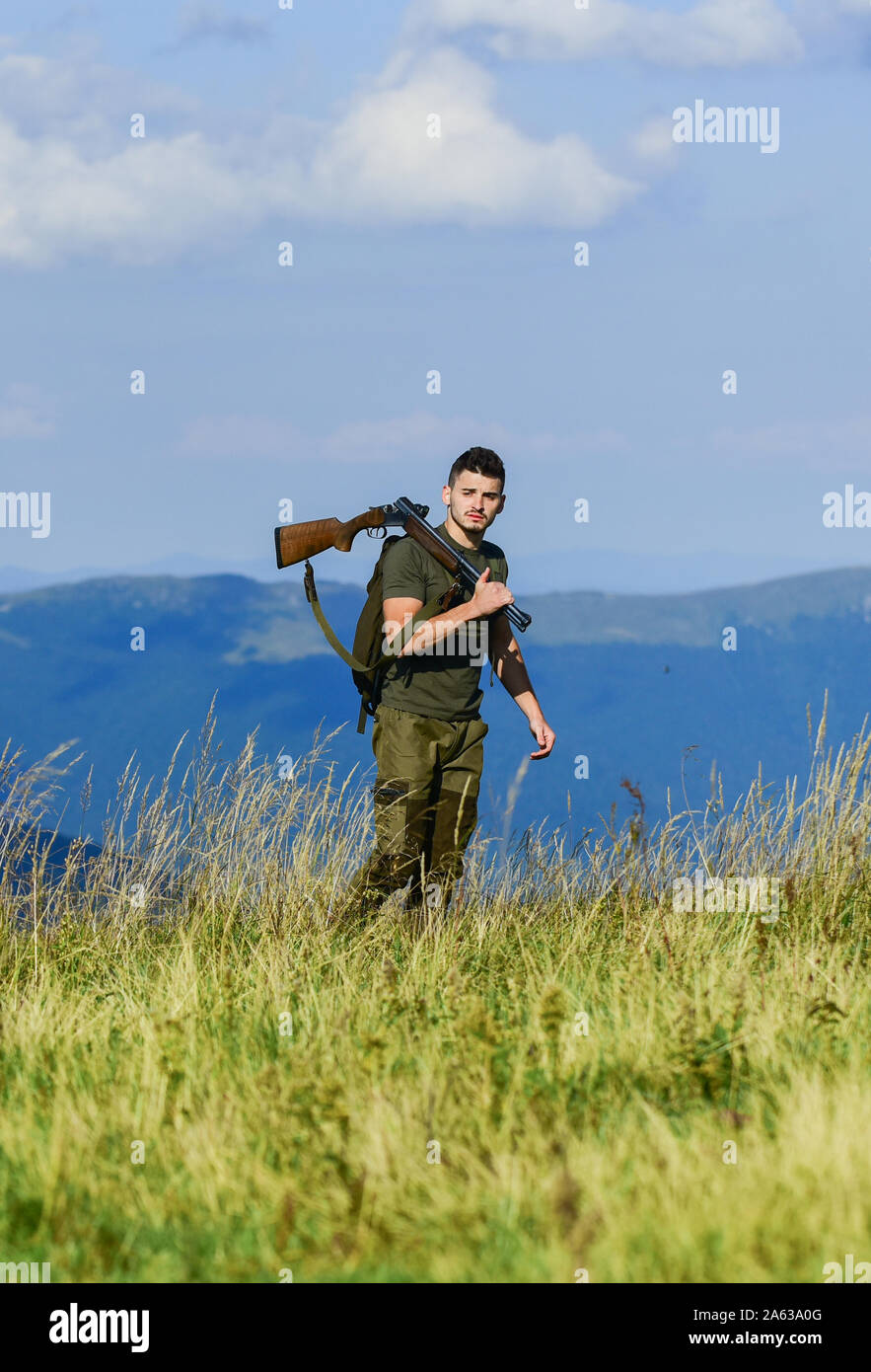 for better tomorrow. soldier in field. polygon. muscular man hold ...