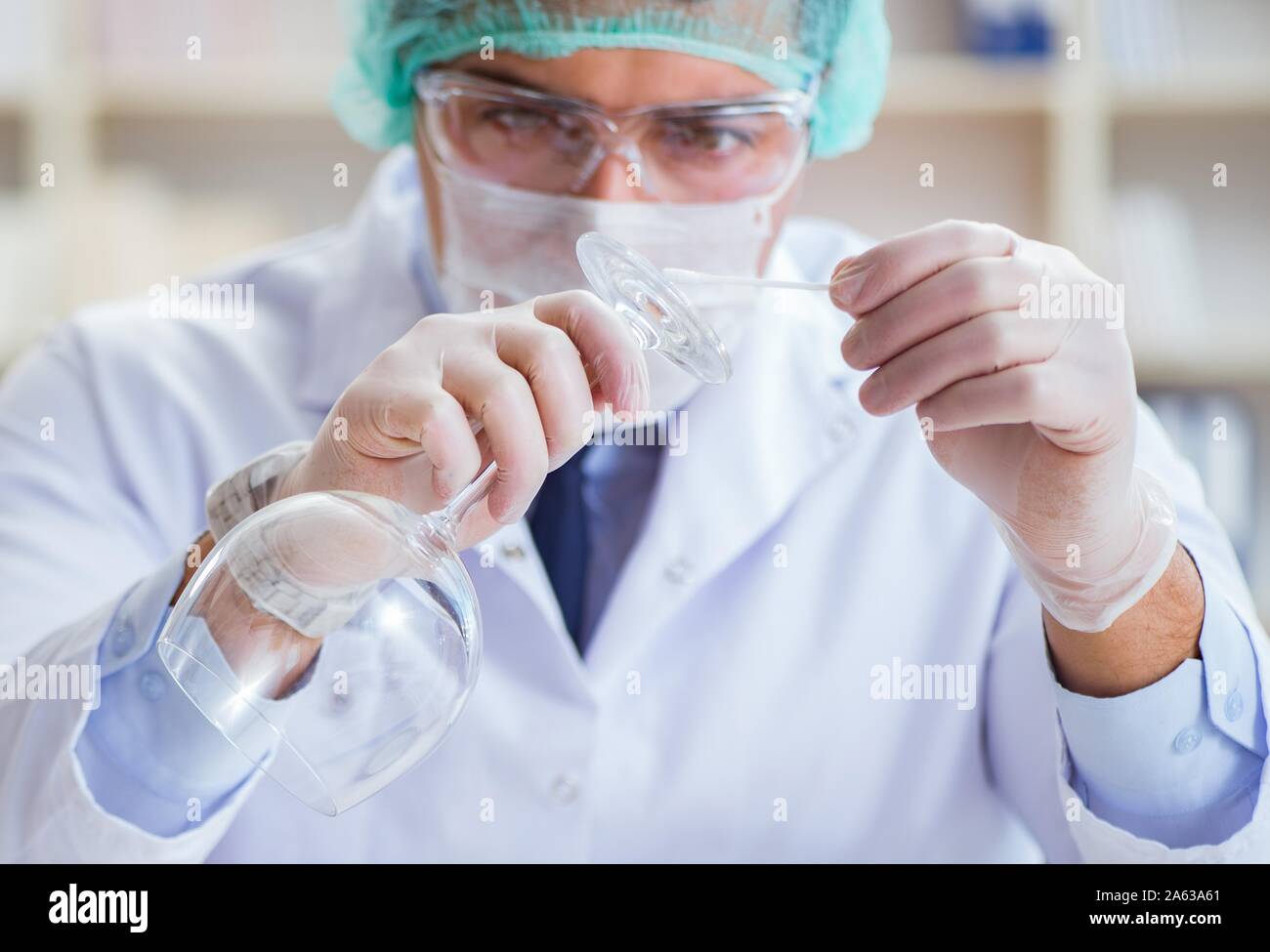 Forensics investigator working in lab on crime evidence Stock Photo - Alamy