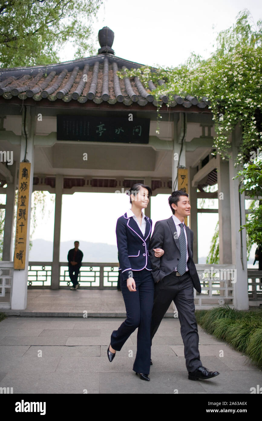 Two women walking arms linked hi-res stock photography and images - Alamy