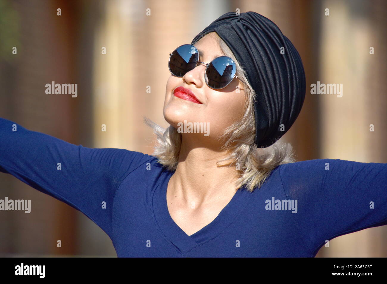 Free Pretty Muslim Female Wearing Turban Stock Photo - Alamy