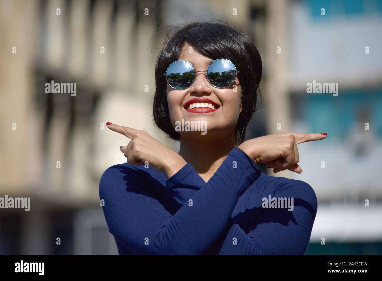 Confused Pretty Female Wearing Sunglasses Stock Photo - Alamy