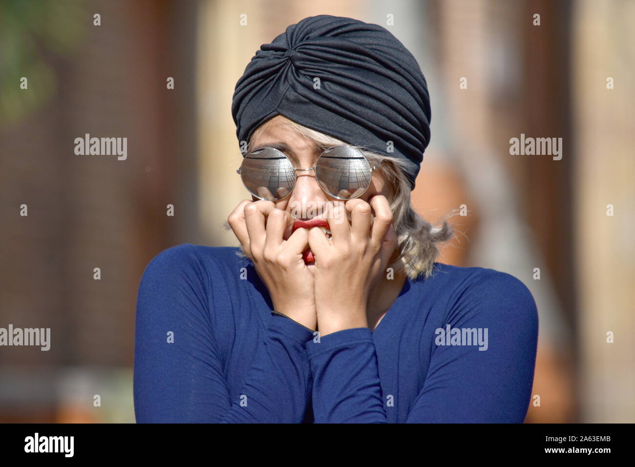 Pretty Muslim Female And Fear Wearing Turban Stock Photo - Alamy
