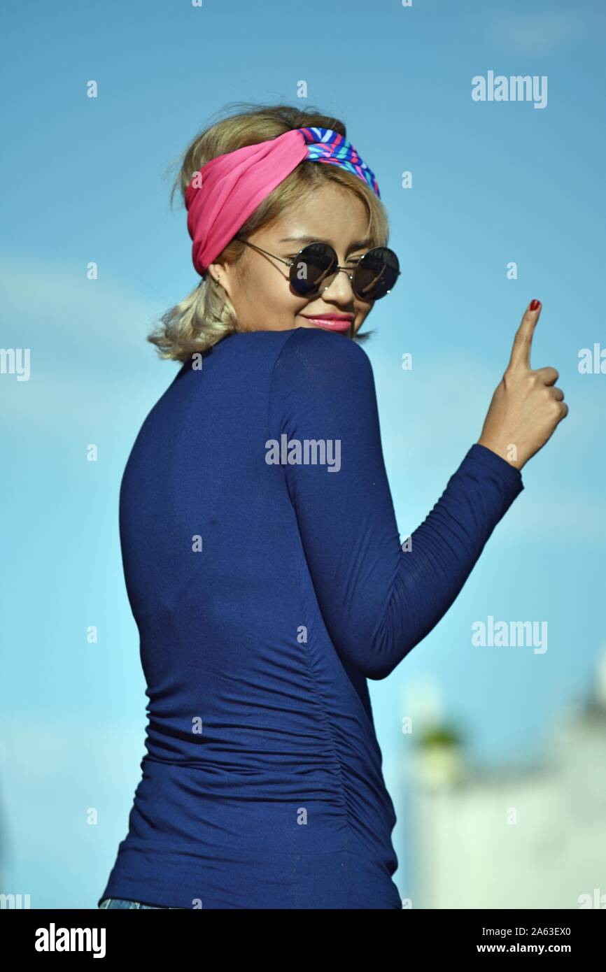 An Attractive Female Pointing Stock Photo - Alamy