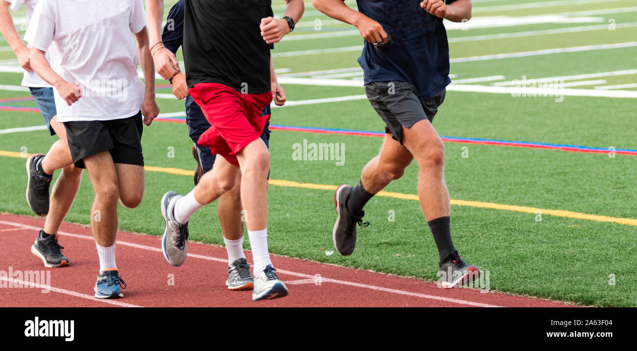Group men running cross country hi-res stock photography and images - Alamy