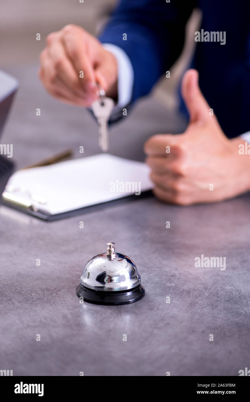 The hotel reception bell at the counter Stock Photo - Alamy