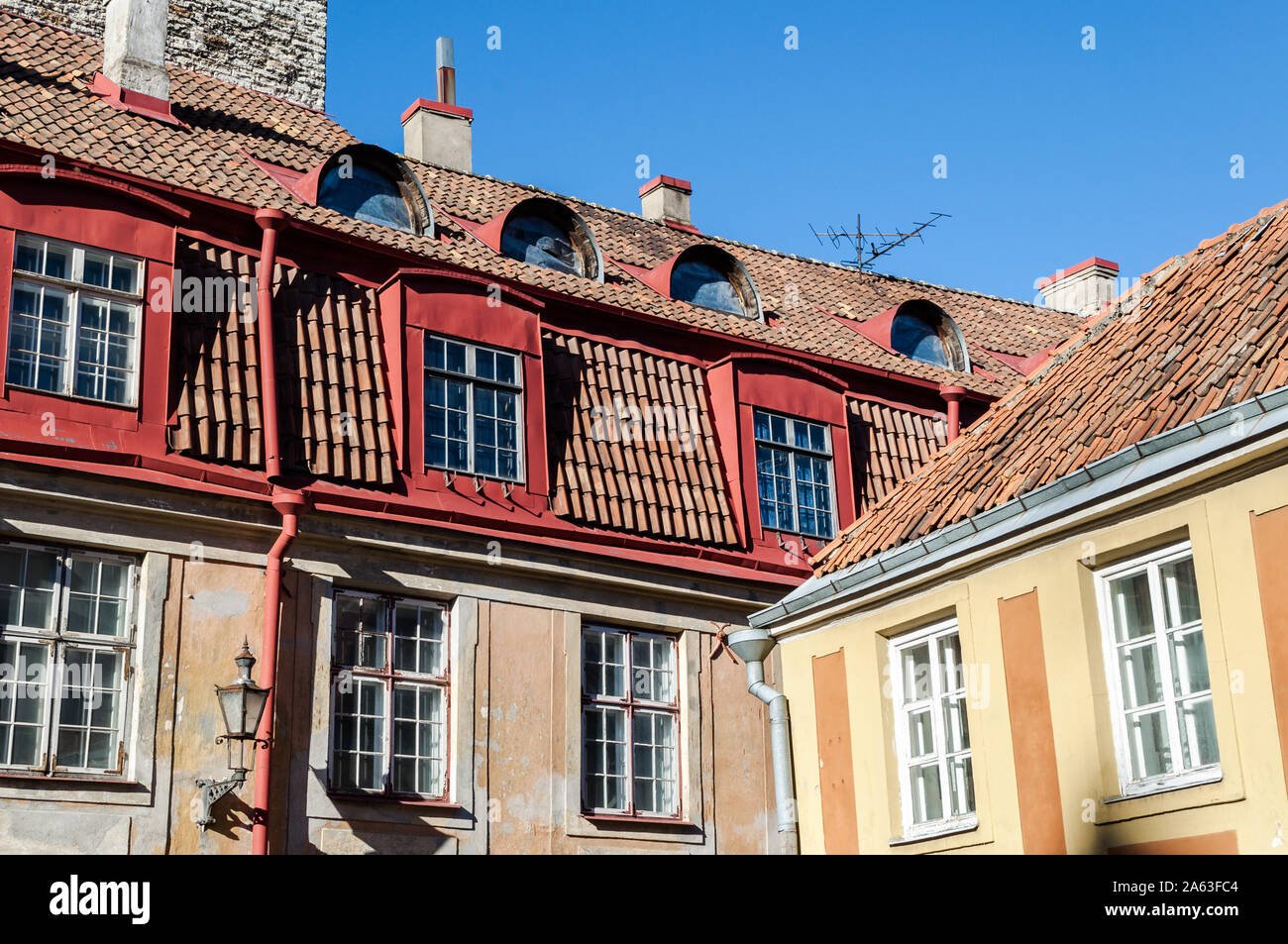 Street in Tallinn Old Town with colorful buildings Stock Photo - Alamy