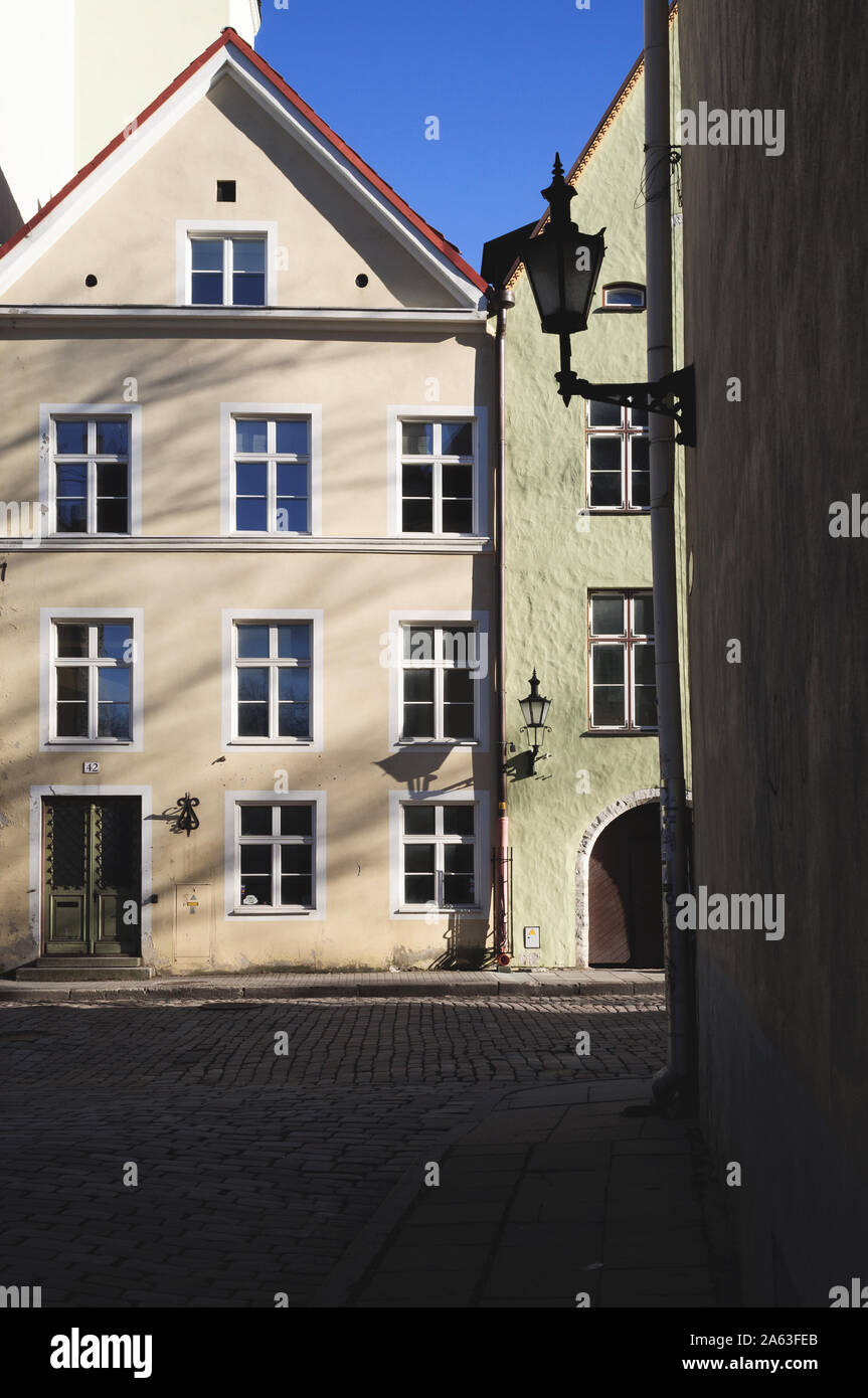 Traditional buildings in Tallinn Old Town against blue sky, Estonia ...