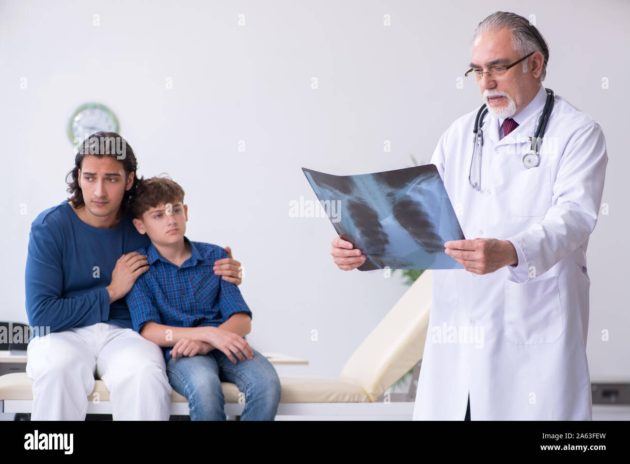 The young boy visiting doctor in hospital Stock Photo - Alamy