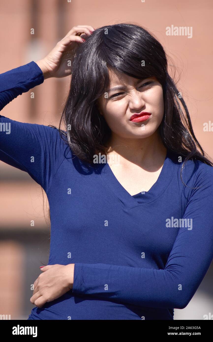 Woman And Confusion Stock Photo - Alamy