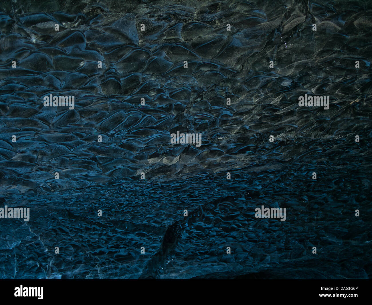 The thick layer of ice from a glacier cave in Iceland Stock Photo - Alamy
