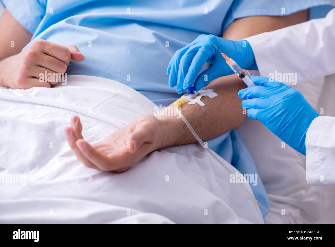 The male patient in blood transfusion concept Stock Photo - Alamy