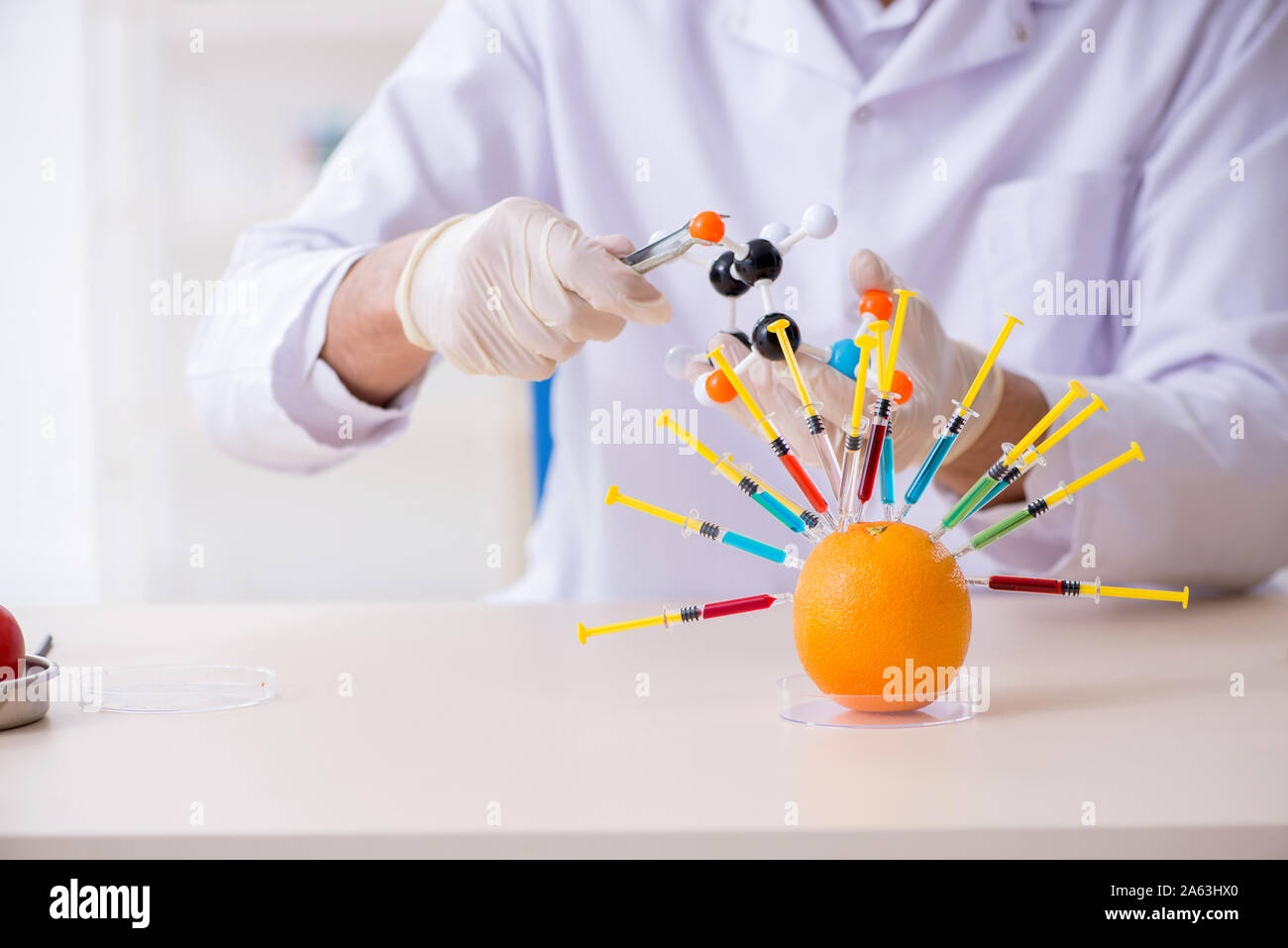The male nutrition expert testing food products in lab Stock Photo - Alamy