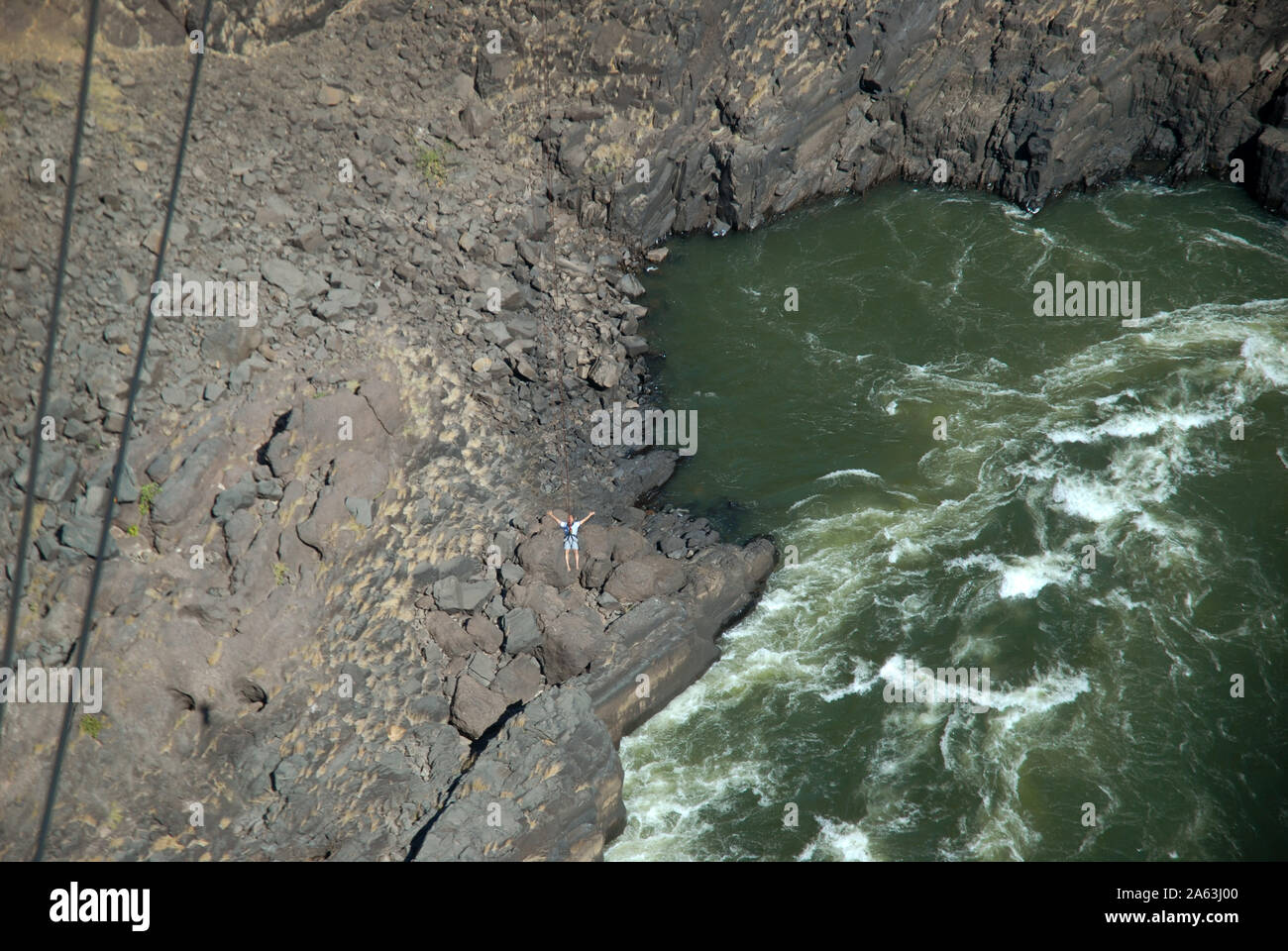 Zip line stretching across gorge, Victoria Falls Bridge, Zimbabwe ...