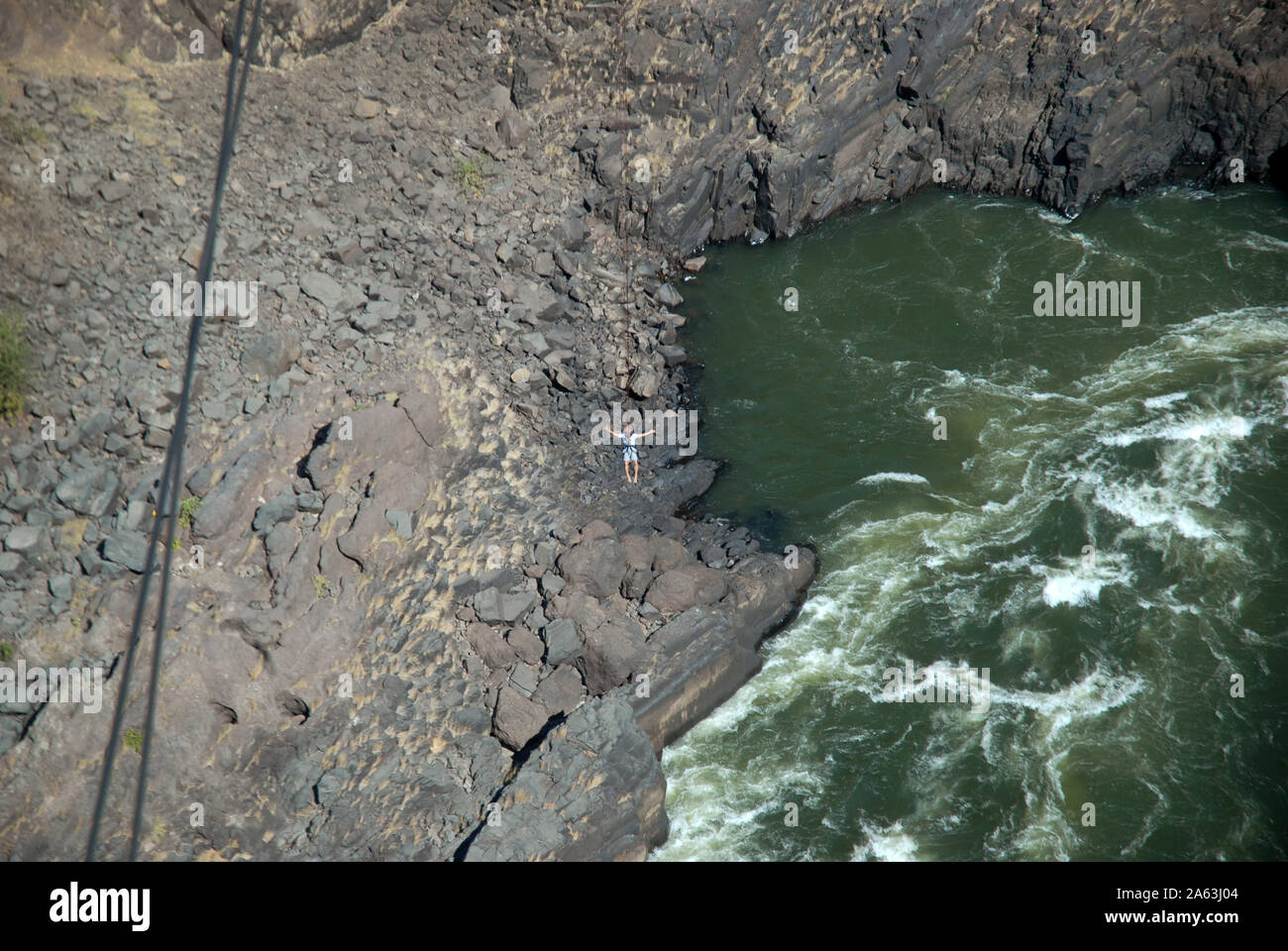 Zip line stretching across gorge, Victoria Falls Bridge, Zimbabwe ...