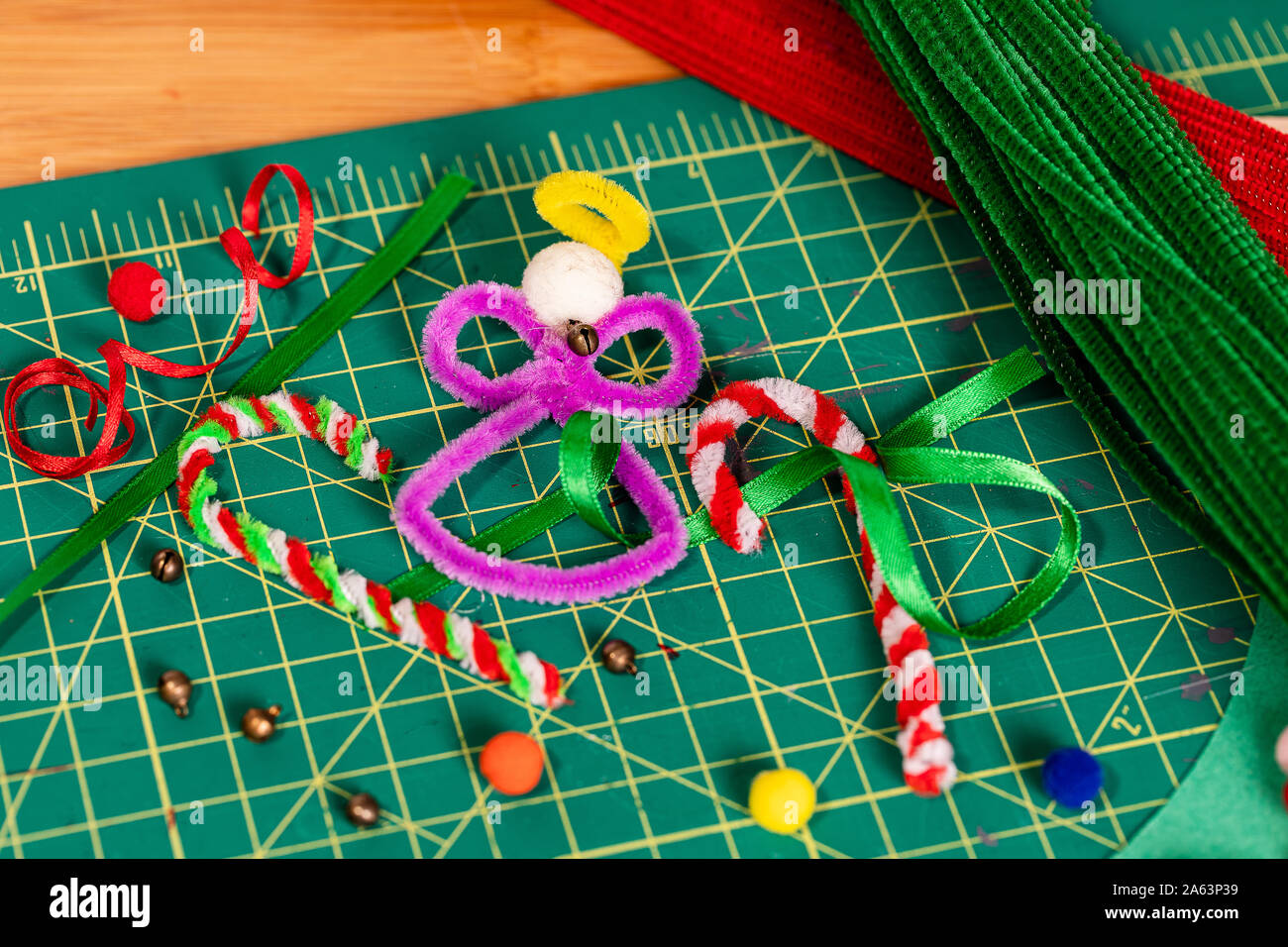 Holiday pipe cleaner crafts. A tight framed Angel and Candy Canes made ...