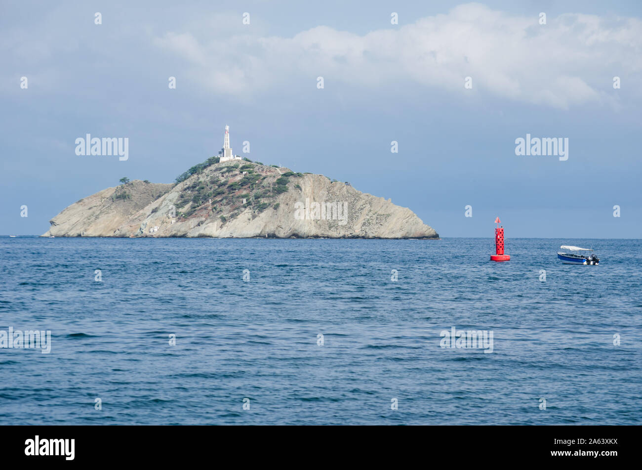 Scene in front of the Bay of Santa Marta. Isla del Morro is seen in the ...