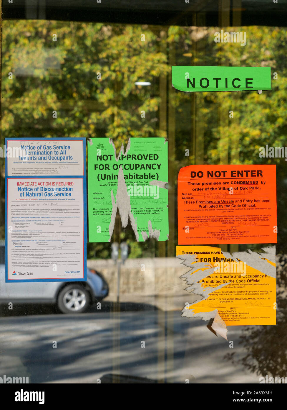 Notices on condemned building. Oak Park, Illinois Stock Photo - Alamy