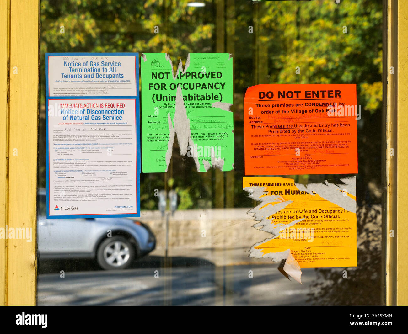 Notices on condemned building. Oak Park, Illinois Stock Photo - Alamy