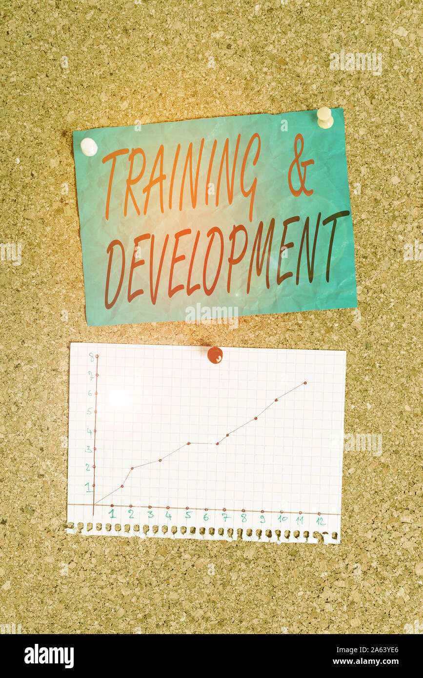Writing note showing Training And Development. Business concept for ...