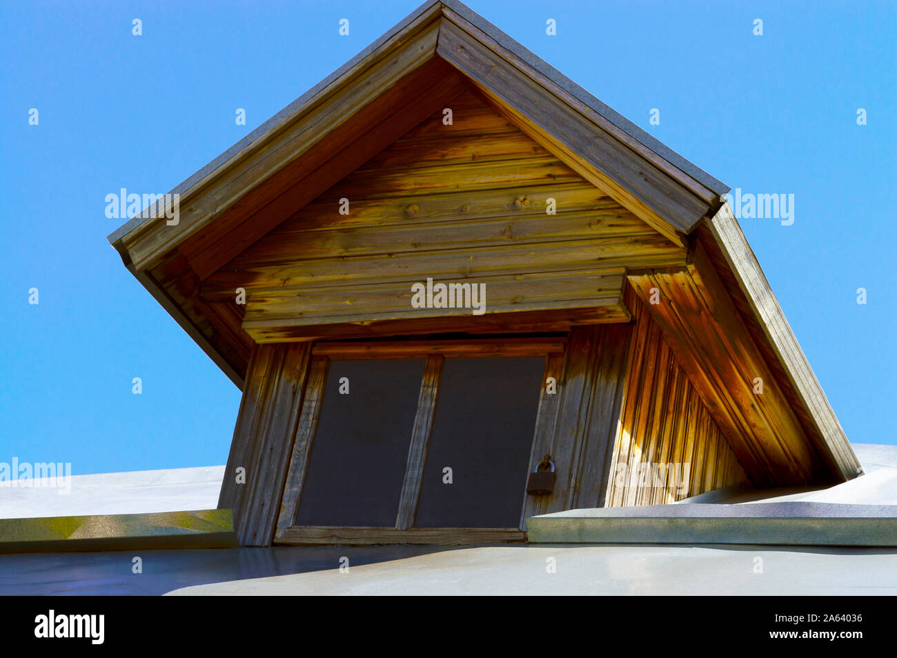 Attic roof window of an old wooden house. View from below Stock Photo ...