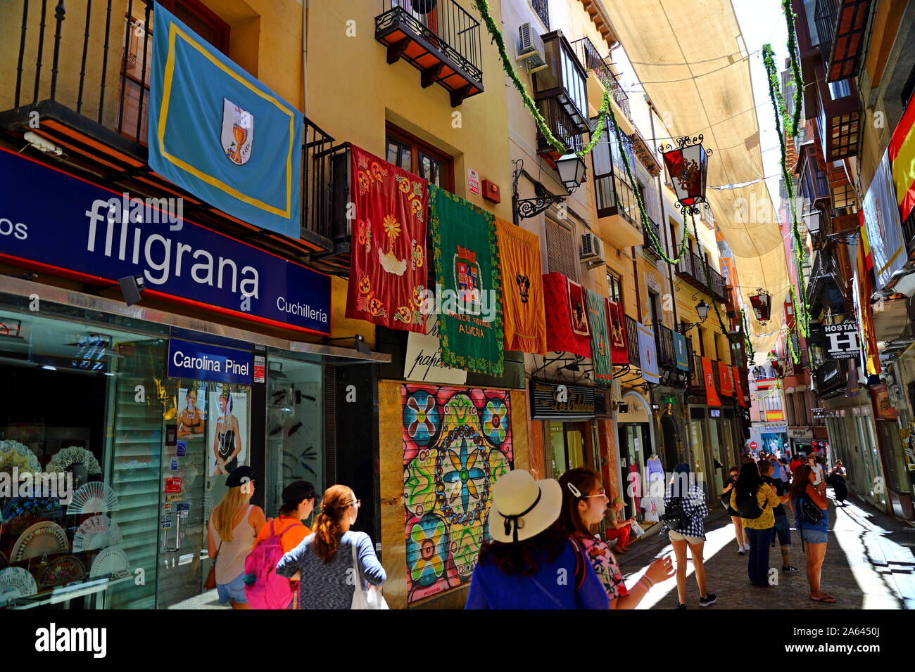 Traditional old Spanish street, in the historic city of Toledo, Spain ...