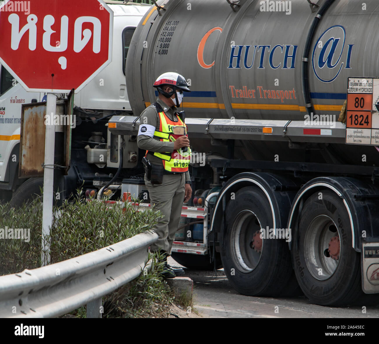 Asian directing traffic intersection hi-res stock photography and ...