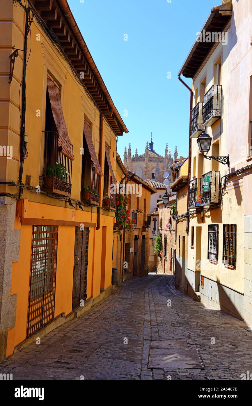 Traditional old Spanish street, in the historic city of Toledo, Spain ...
