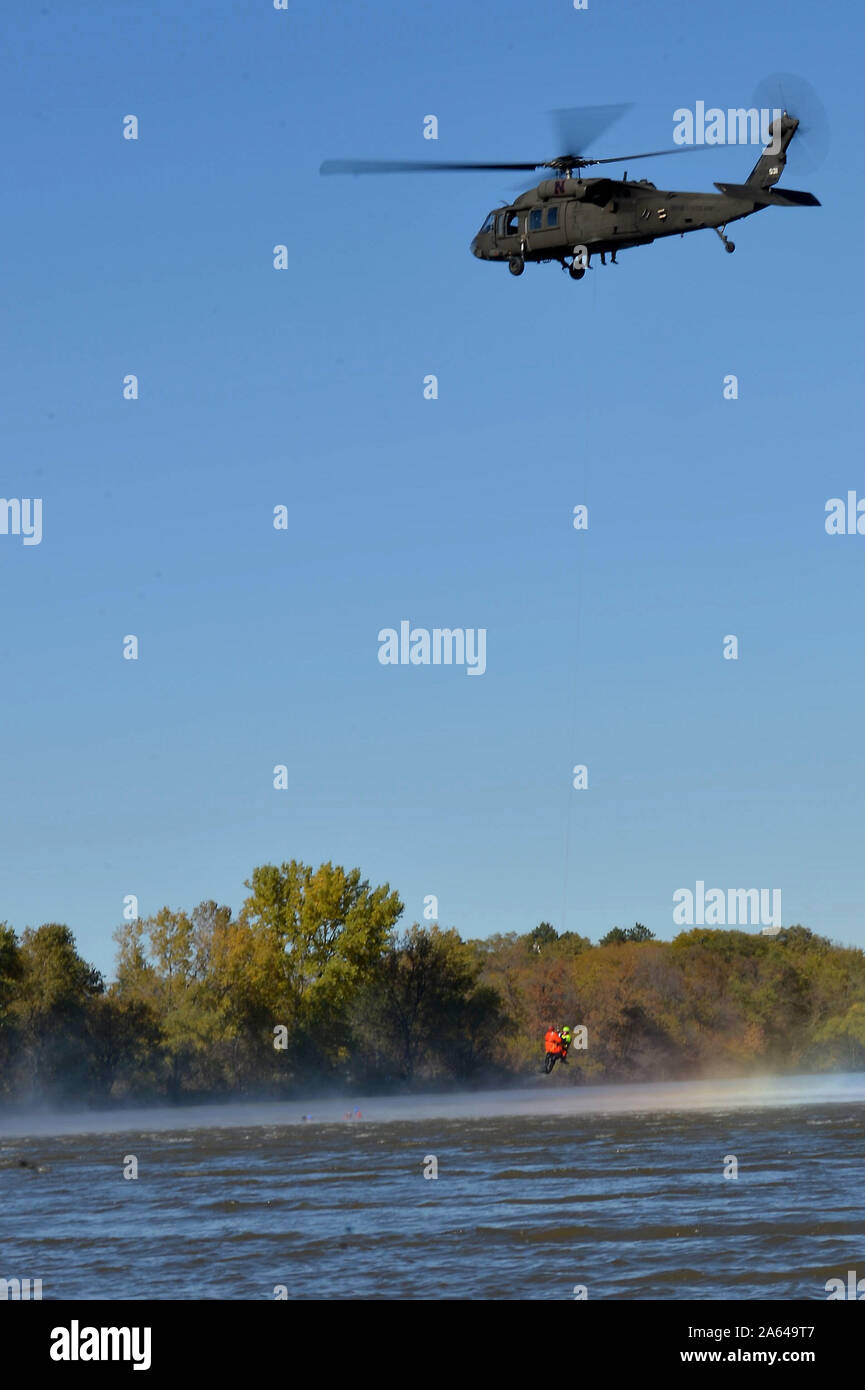 A Nebraska Army National Guard UH-60 Blackhawk hovers over a simulated ...