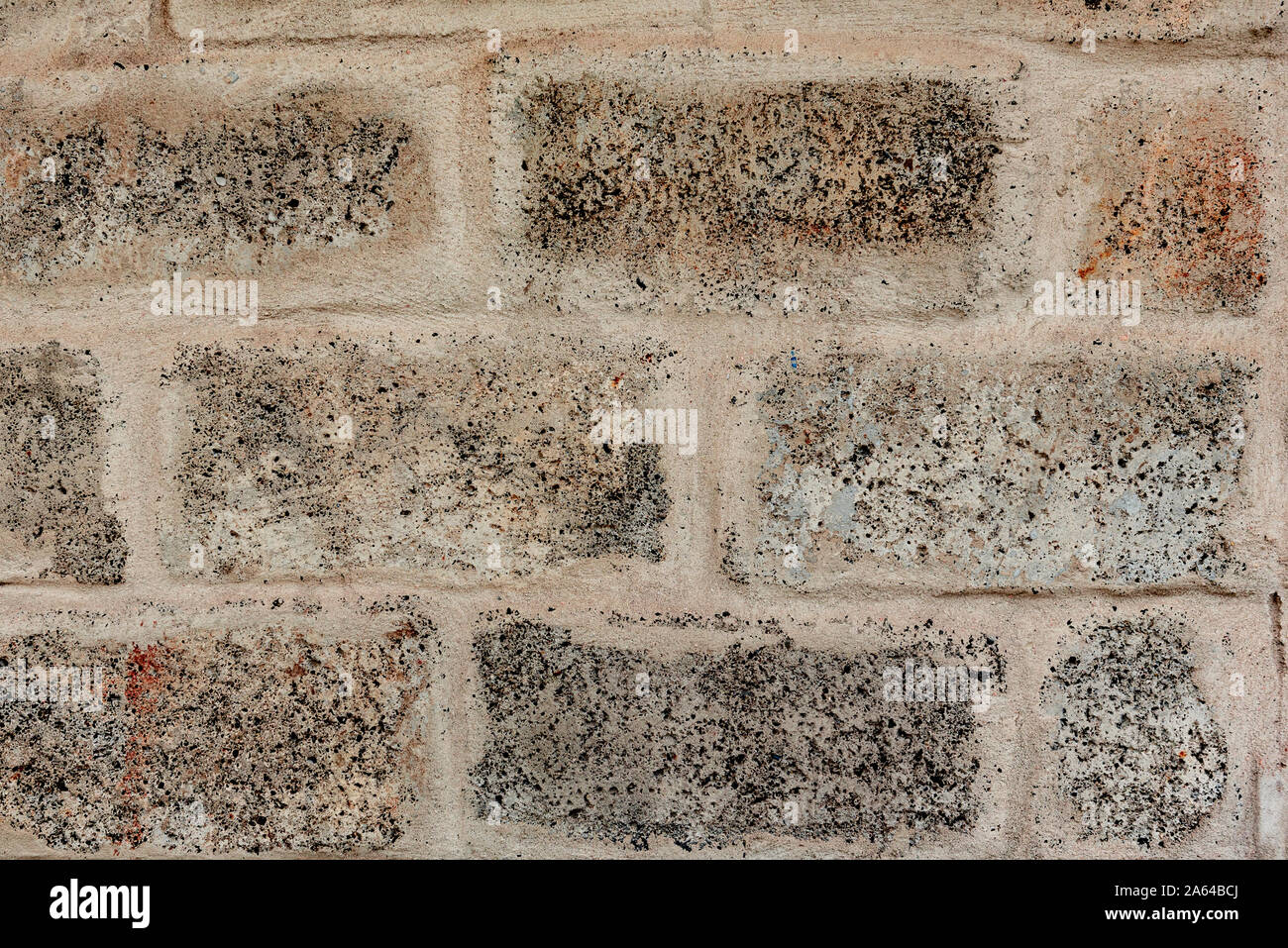 Texture of a brick wall with cracks and scratches which can be used as ...