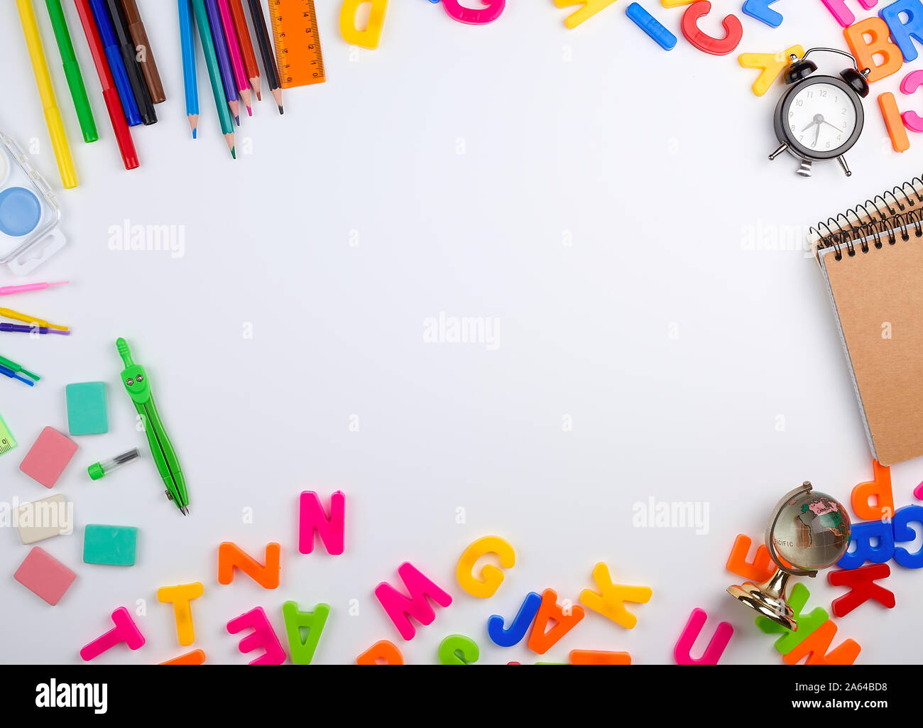 set of different school colorful items for learning at school on a ...