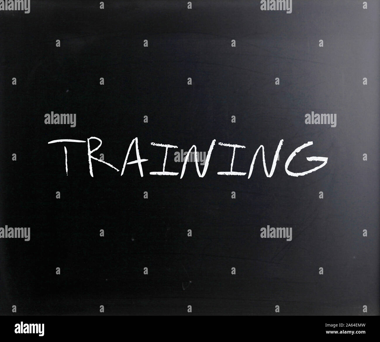 "Training" handwritten with white chalk on a blackboard Stock Photo - Alamy