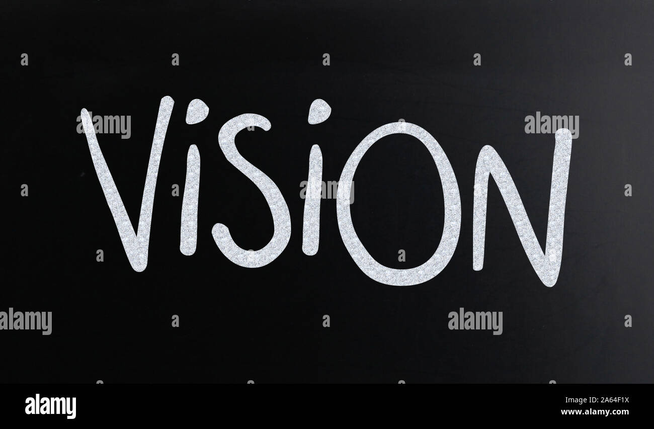 The word "Vision" handwritten with white chalk on a blackboard Stock ...